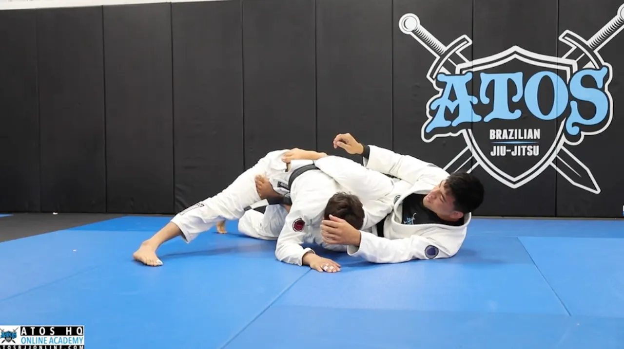 Omoplata Attack From Butterfly Guard - Michael Liera Jr. - Atos BJJ ...