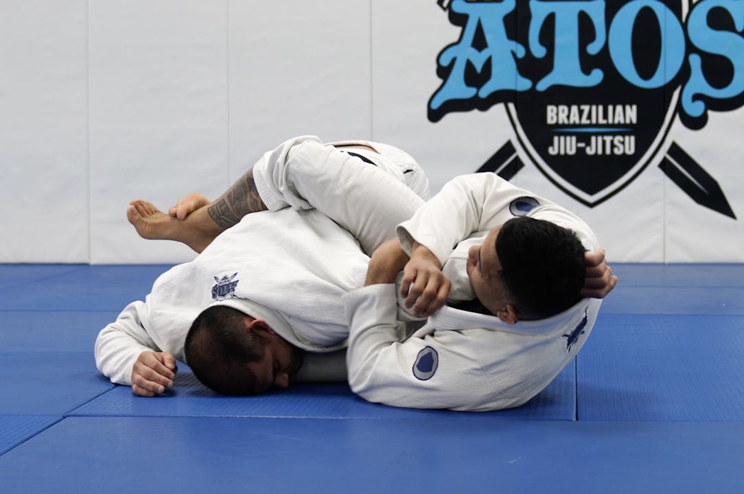 Straight Arm Bar From Closed Guard with Sweep - Rolando Samson - Atos ...
