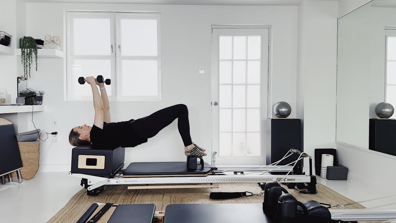 Hip Lift on Elevated box (#018) - Reformer 2 - Teach ONFORM