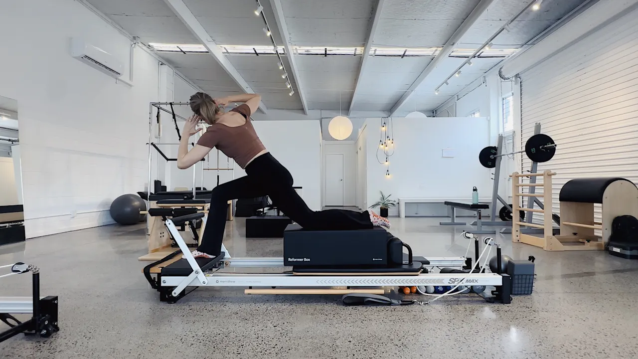 Glute lunge with knee on long box (#010) - Reformer 2 - Teach ONFORM