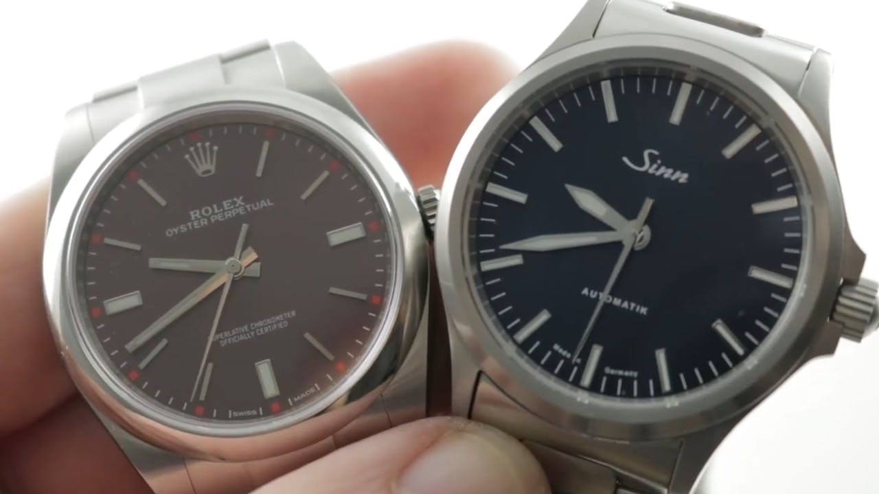 Rolex Oyster Perpetual 39mm 114300 vs Sinn 556 IB Blue Dial 556.0104 ...